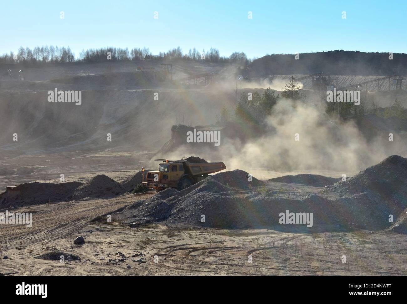 Big mining truck transportion sand in the open-pit. Heavy machinery in ...