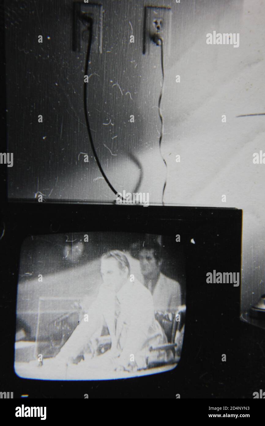 Fine 1970s vintage black and white photography of someone watching the tv show Stock Photo - Alamy