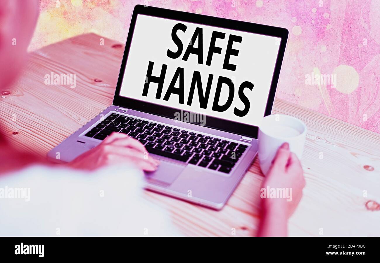 Text sign showing Safe Hands. Business photo showcasing Ensuring the ...