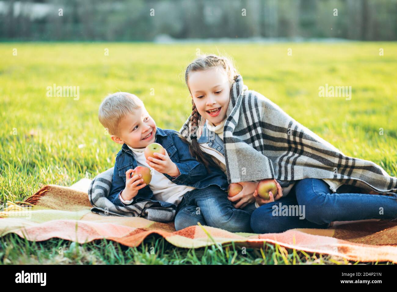 Brother and sister hug each other Stock Photo - Alamy