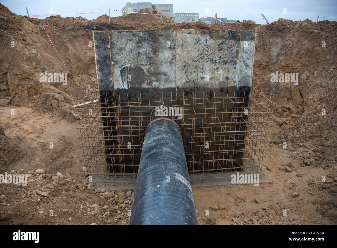 Connecting a trench drain to a concrete manhole structure at ...
