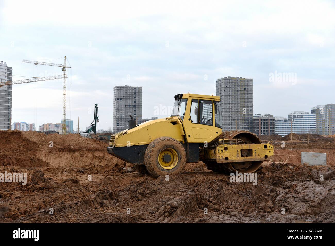 Vibration single-cylinder road roller leveling the ground for the ...