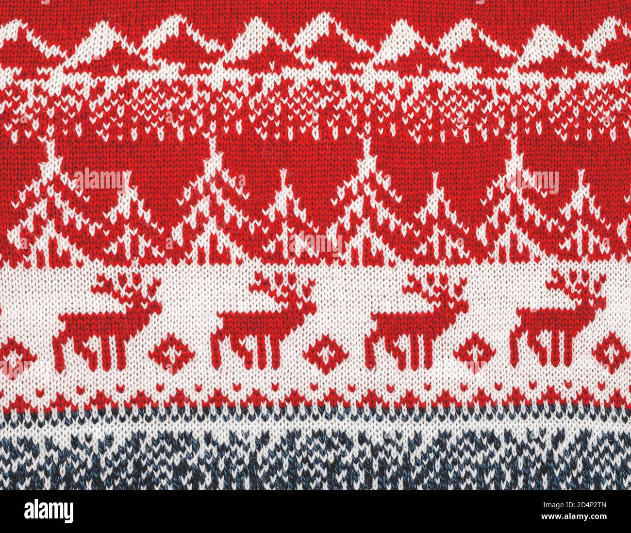 Knitted fabric with red and blue Scandinavian geometric ornament Stock ...