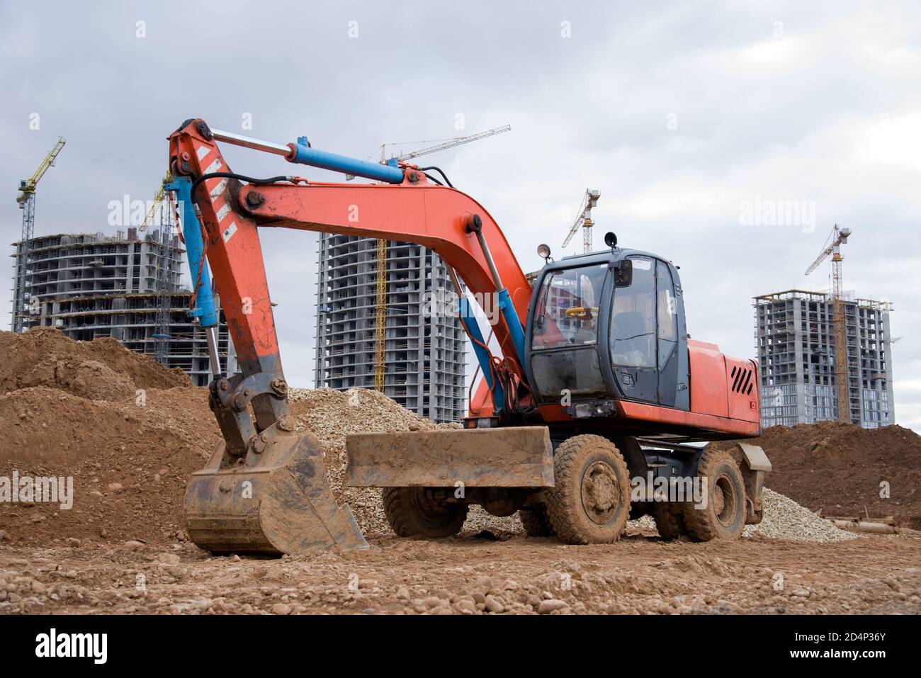 Hydraulic excavator installing pipeline hi-res stock photography and ...