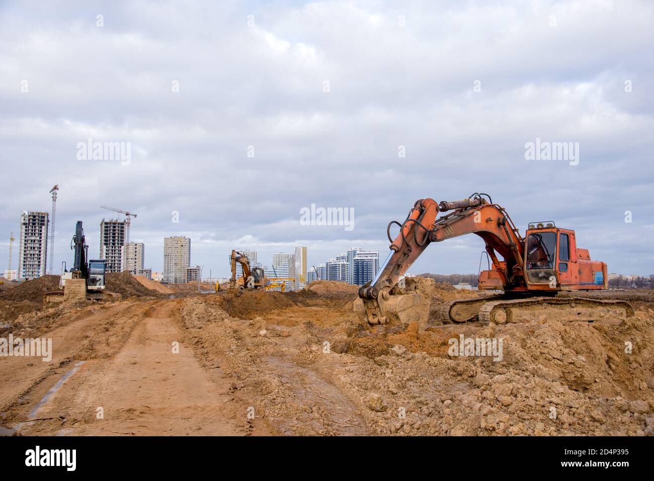 Hydraulic excavator installing pipeline hi-res stock photography and ...