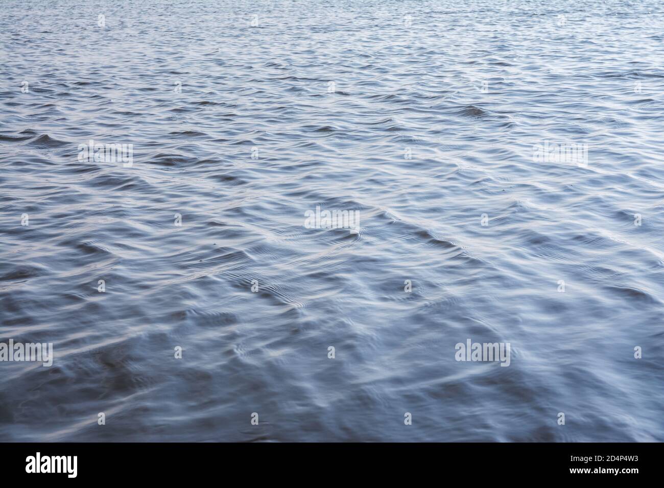 High angle shot of the ripples on the surface of the ocean Stock Photo ...
