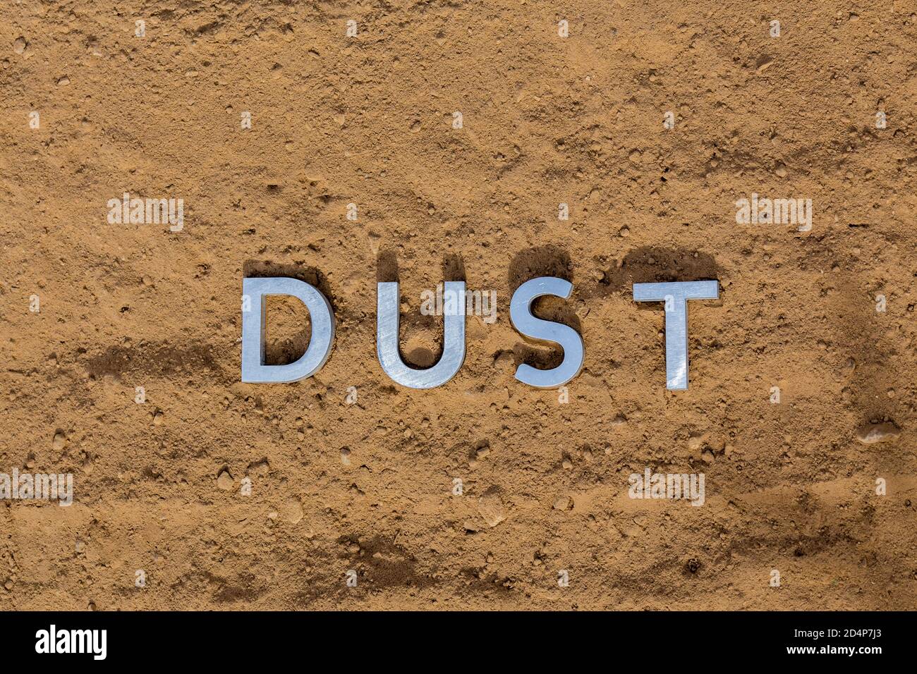 the word dust on dusty road surface in flat lay perspective Stock Photo ...
