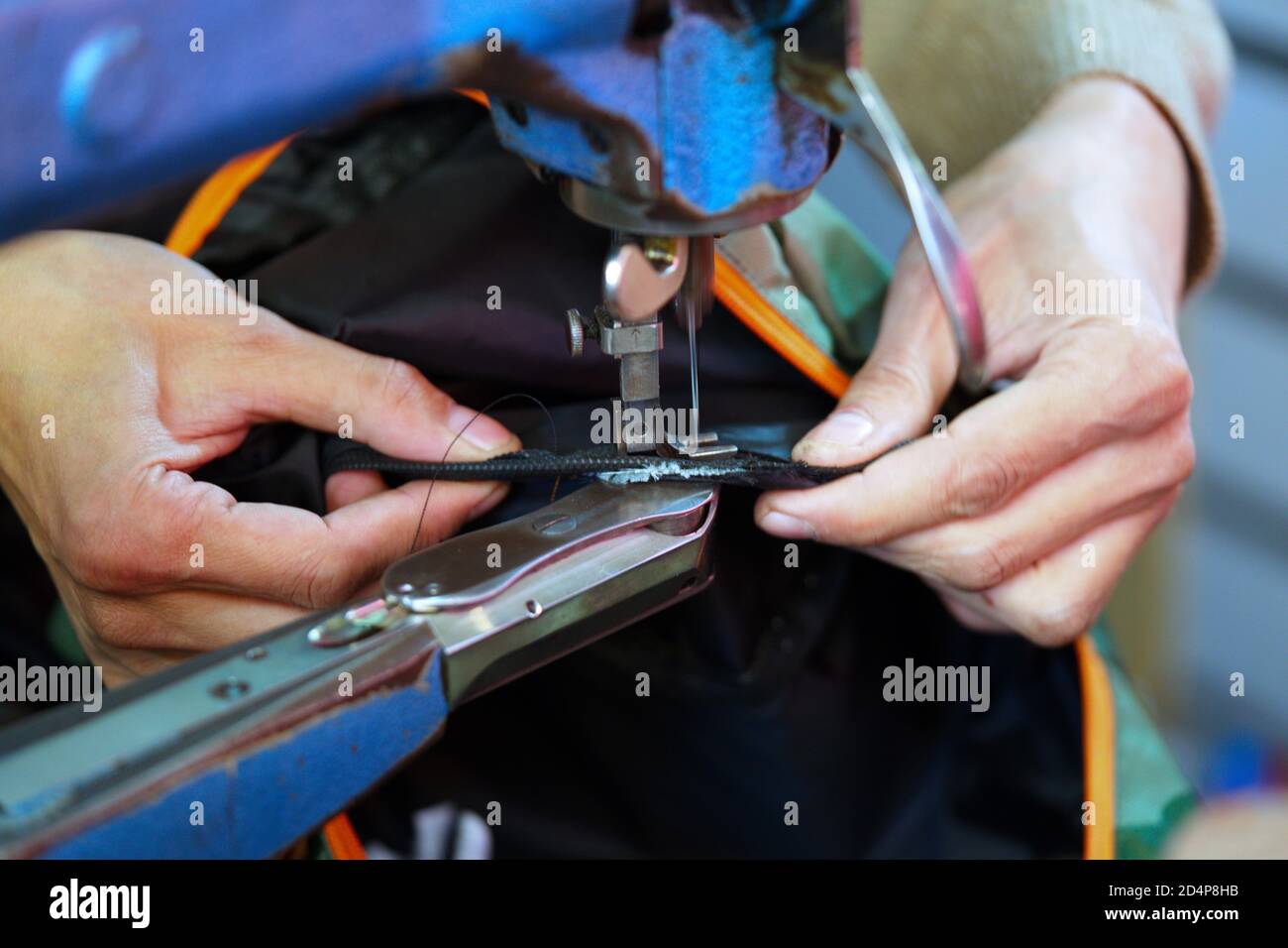 tailor, seamstress. Sewing Machine Needle in Motion. The process of ...