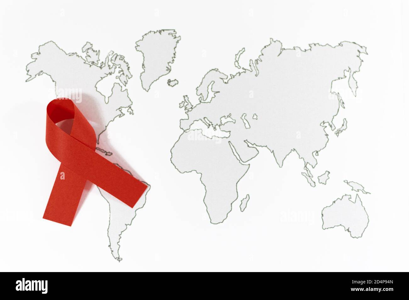 World map with a red ribbon put on the North America - Worlds Aid Day ...