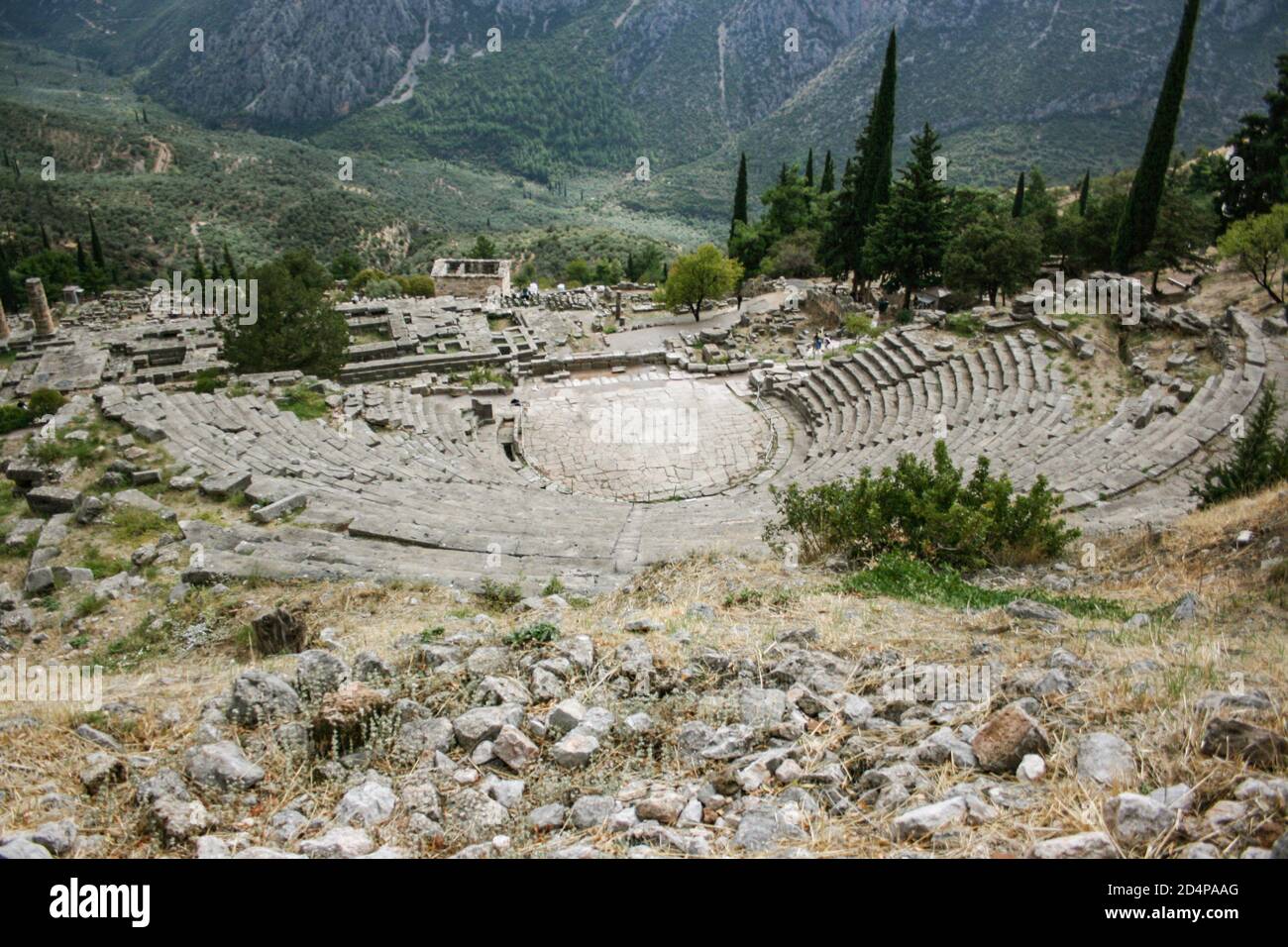 The ancient Greek theatre in the archaeological site of Delphi Stock ...