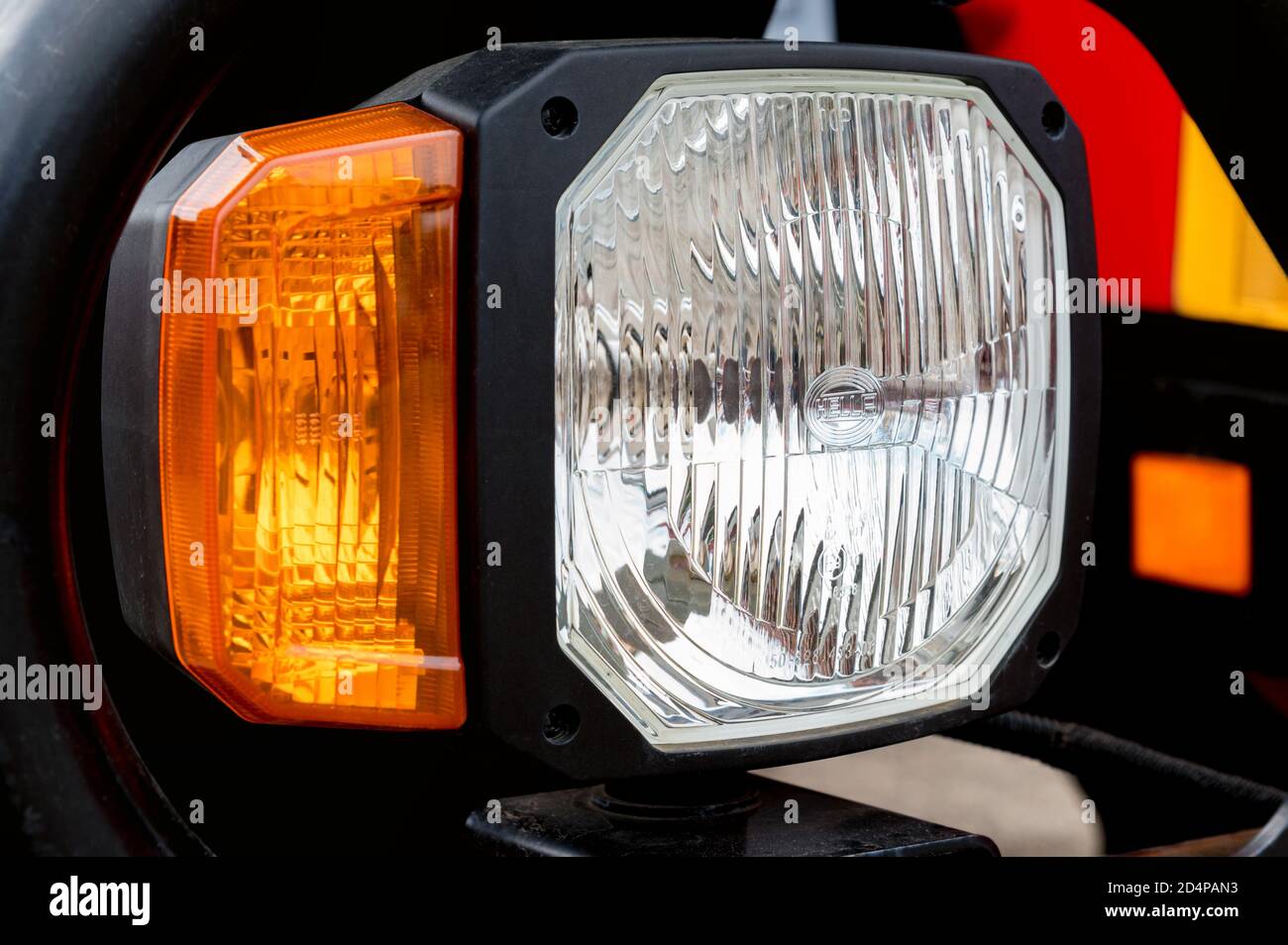 A close up of a headlight of a tractor Stock Photo - Alamy