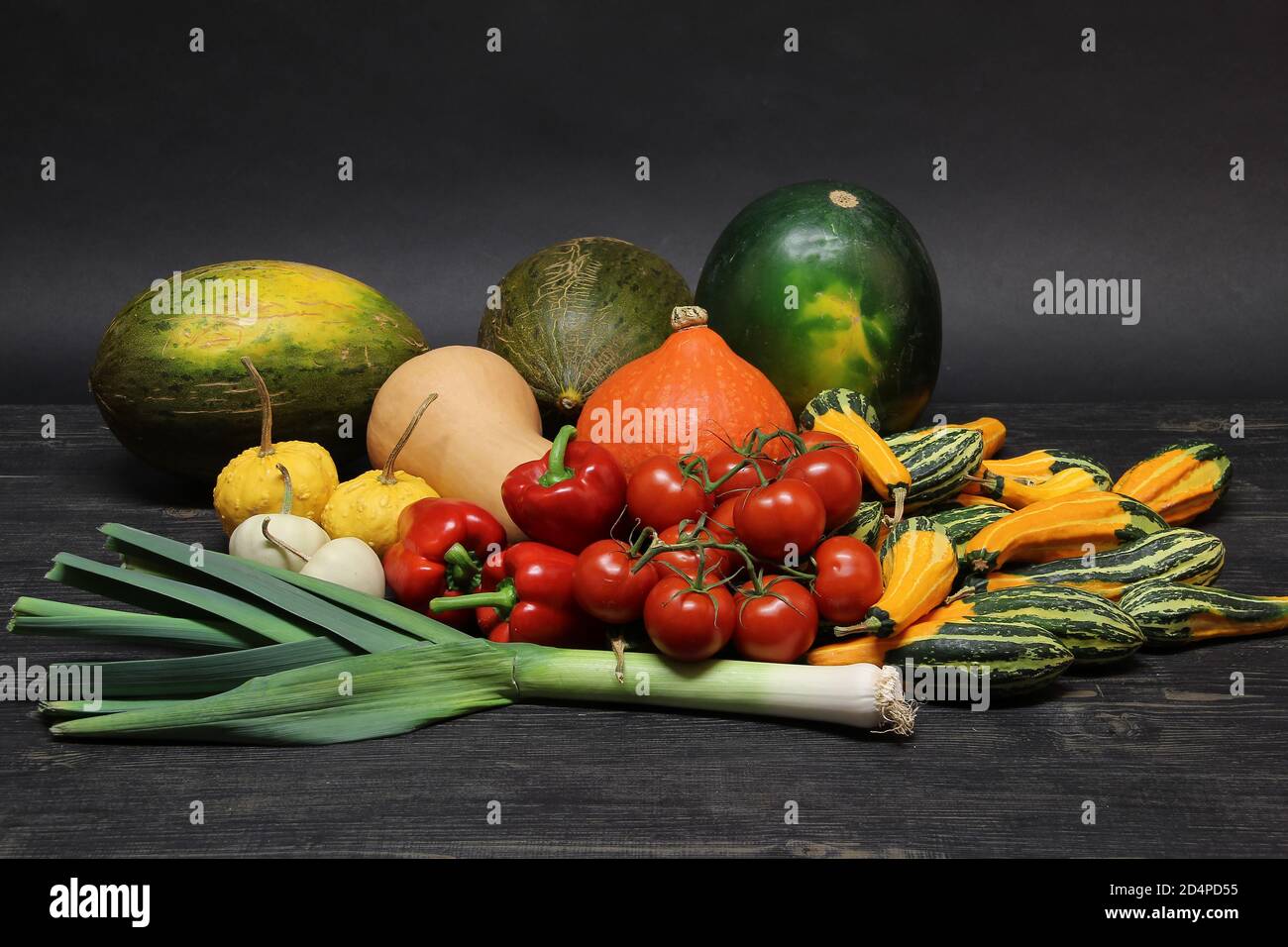 Closeup shot of assorted vegetables isolated on a dark background Stock ...