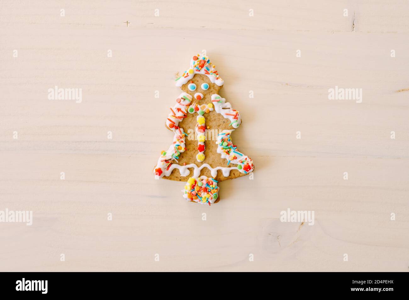 Gingerbread cookies in the shape of a Christmas tree, decorated with ...