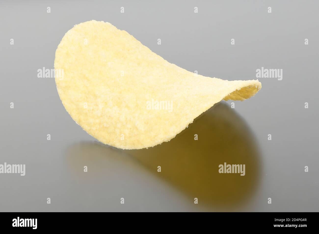 Single potato chip isolated on screen background. High resolution photo ...