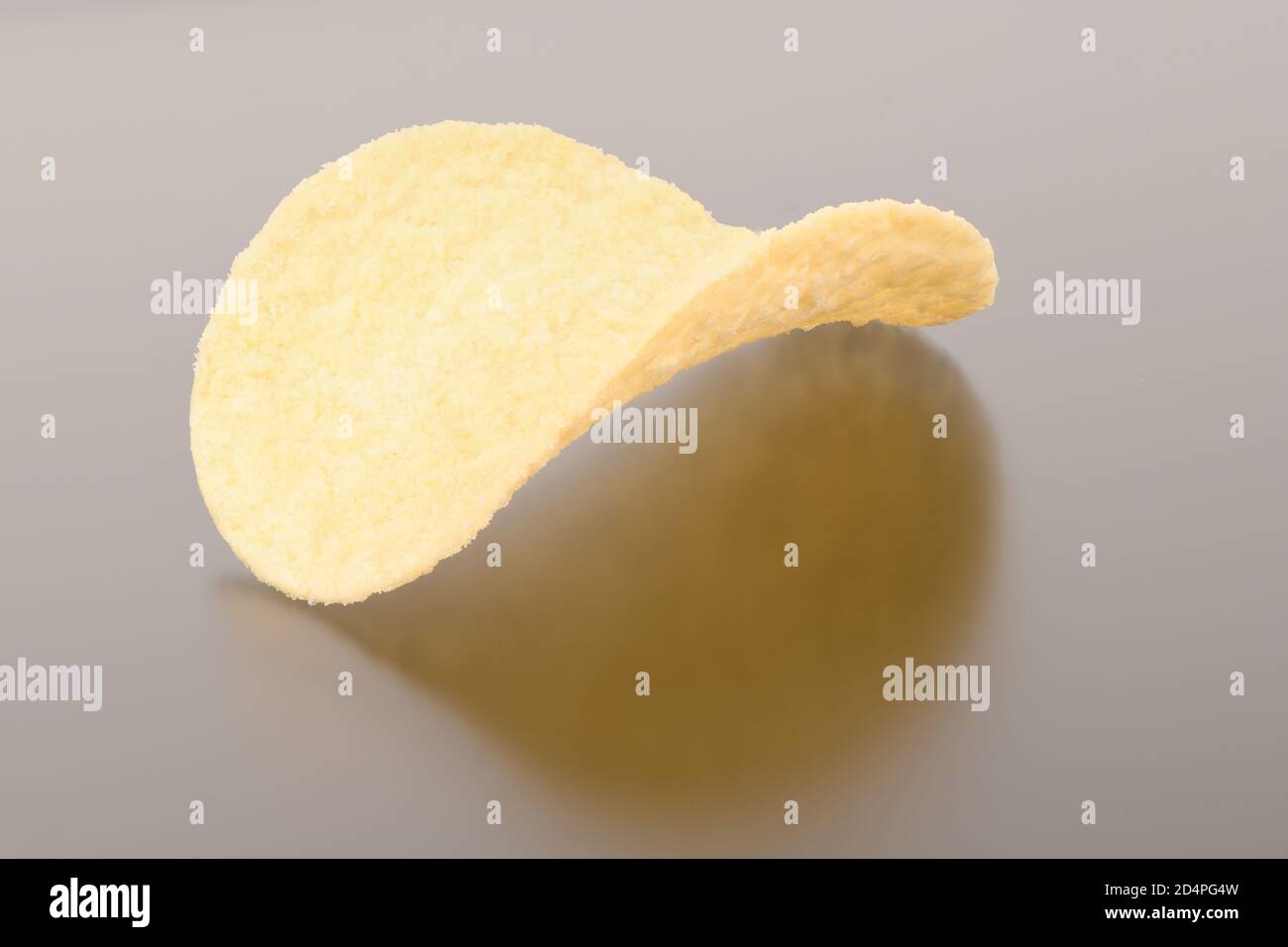 Single potato chip isolated on screen background. High resolution photo ...
