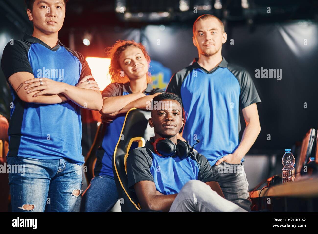 Winning team. Group of multiracial professional cybersport gamers ...