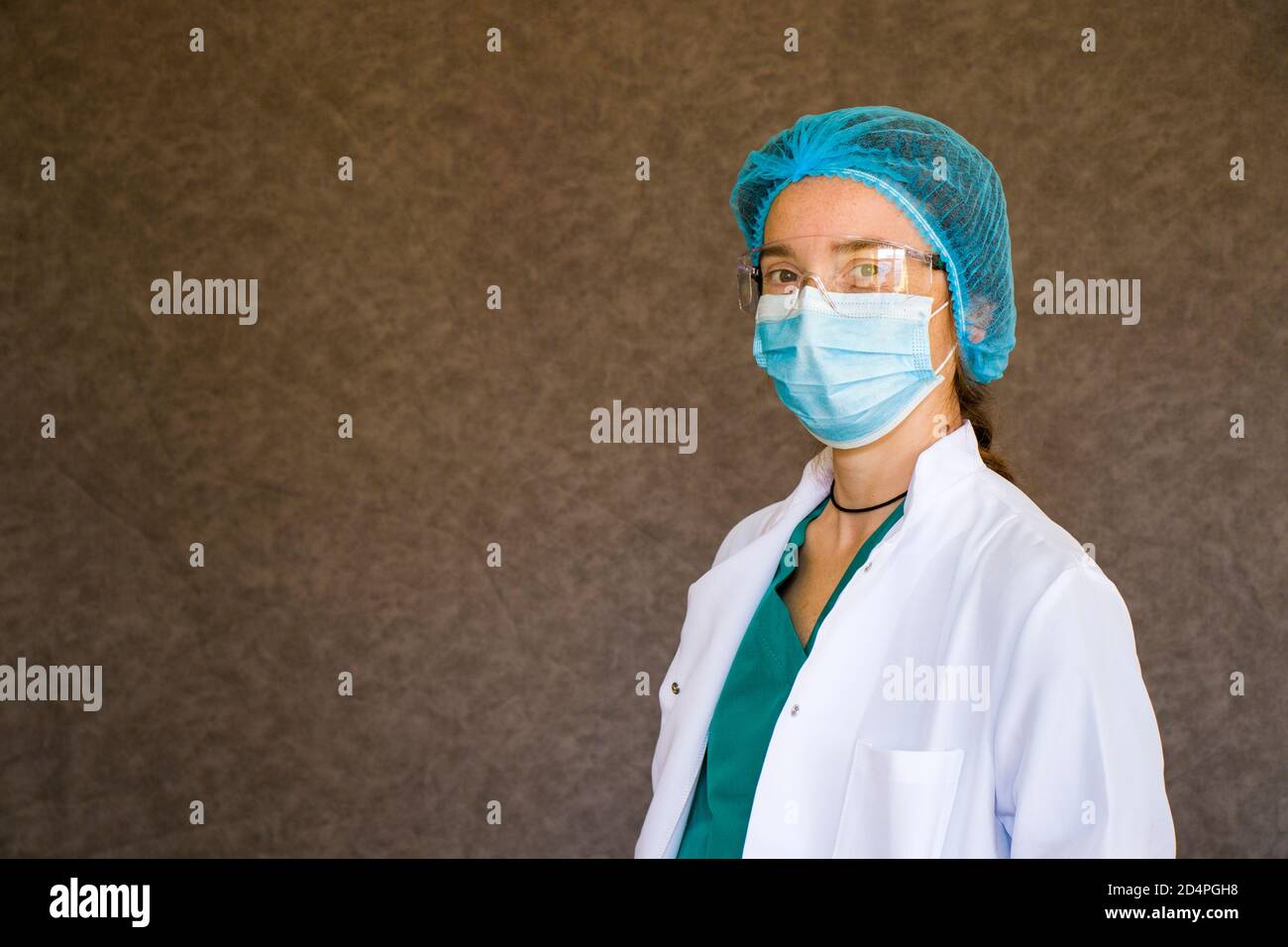 Woman doctors portrait, doctors with mask, glasses, glove and uniform ...