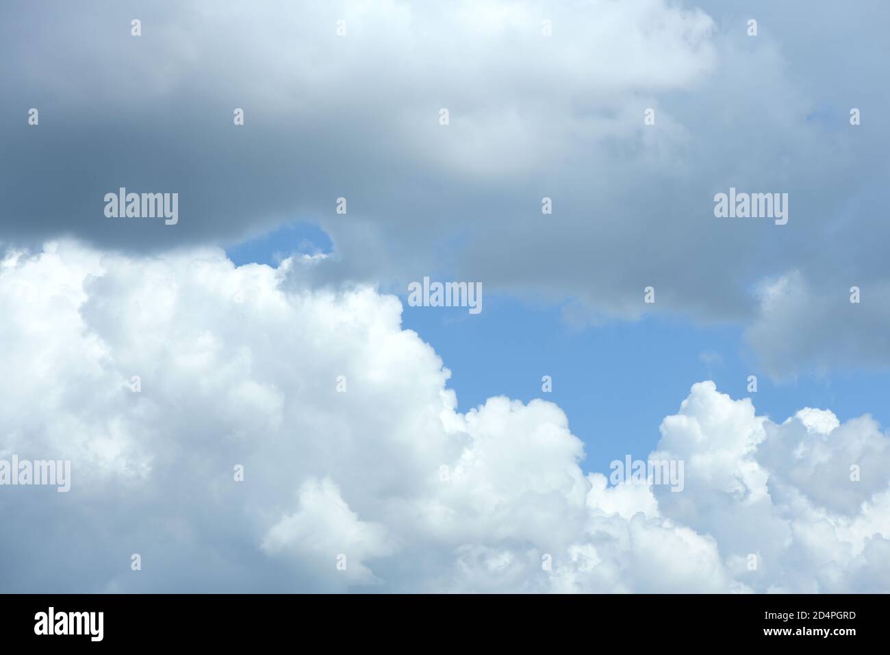 Scattered cloud clusters in a blue sky backgound. High resolution photo. Full depth of field ...