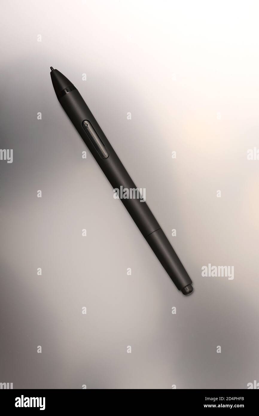 Stylus for digital tablet isolated on screen background. High ...