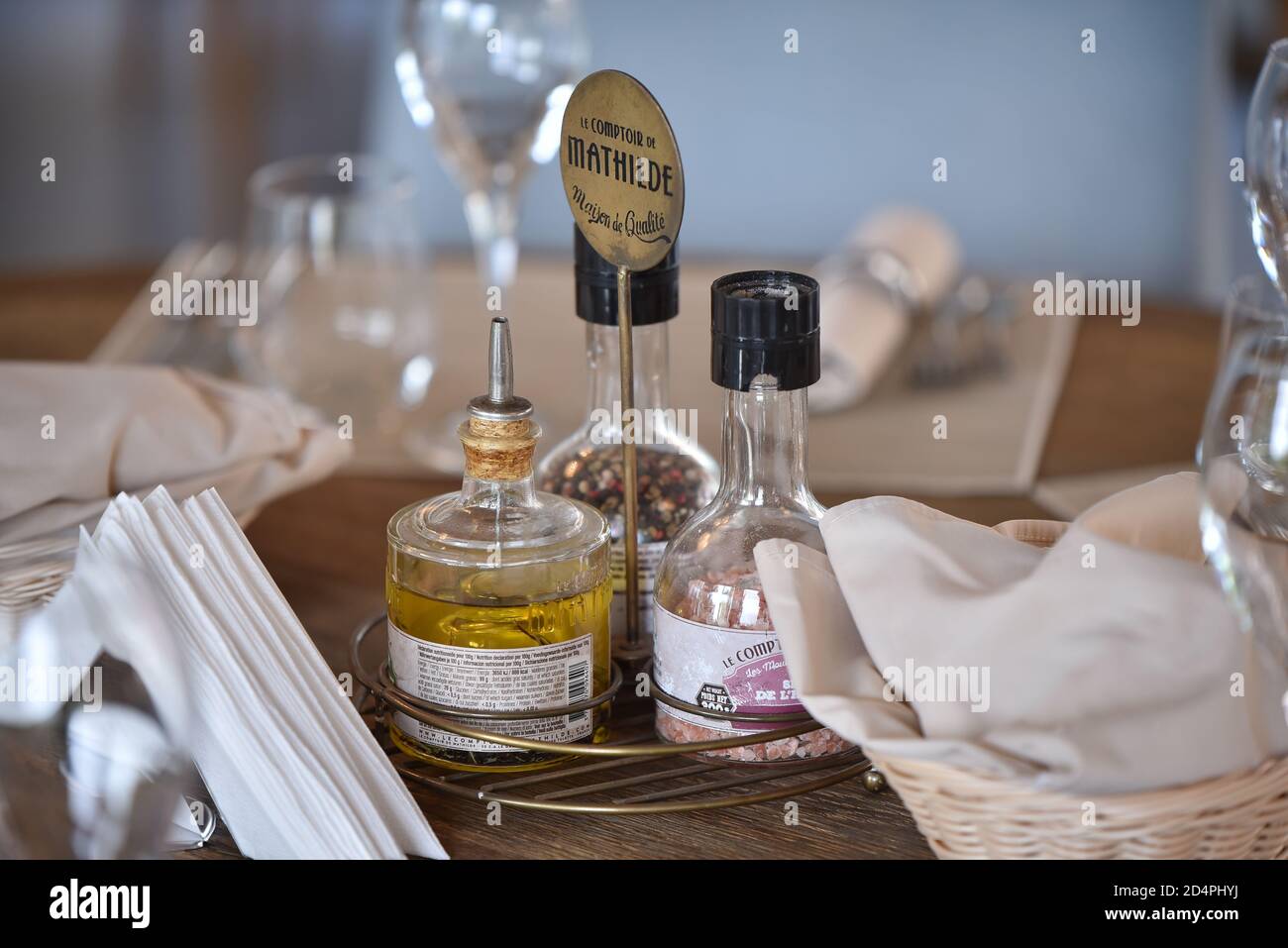 Closeup of an oil, salt, and pepper set on the table Stock Photo - Alamy