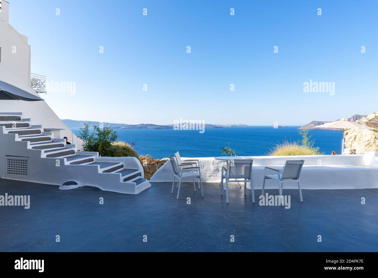 Greek style blue table chairs hi-res stock photography and images - Alamy