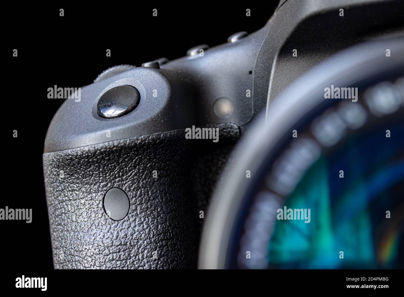 The shot button with lens of camera, close up. A front view of the part ...