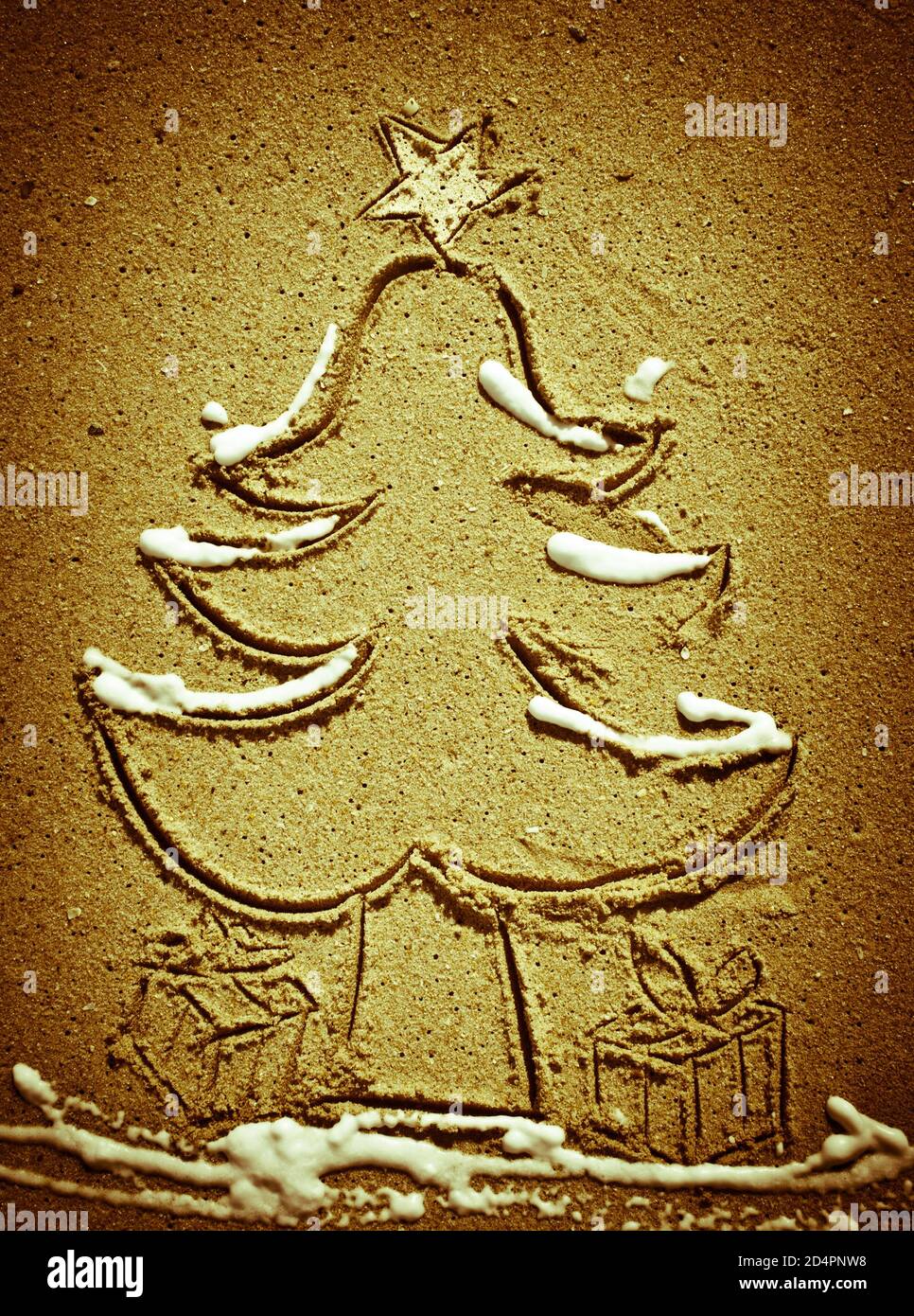 Hand painted Christmas tree in the sand on a beach in Morocco, North ...