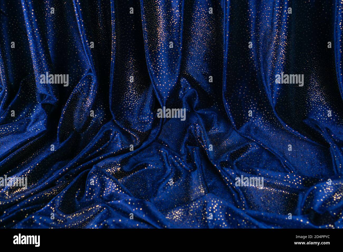 Mesmerizing shot of the blue and sparkling curtain Stock Photo - Alamy