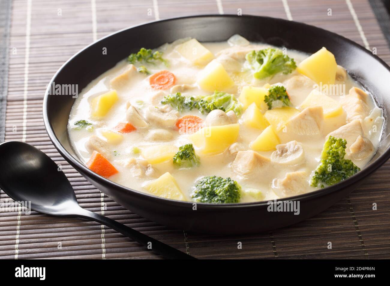 Winter Japanese Cream Stew is a mix of meat and vegetables cooked in a ...