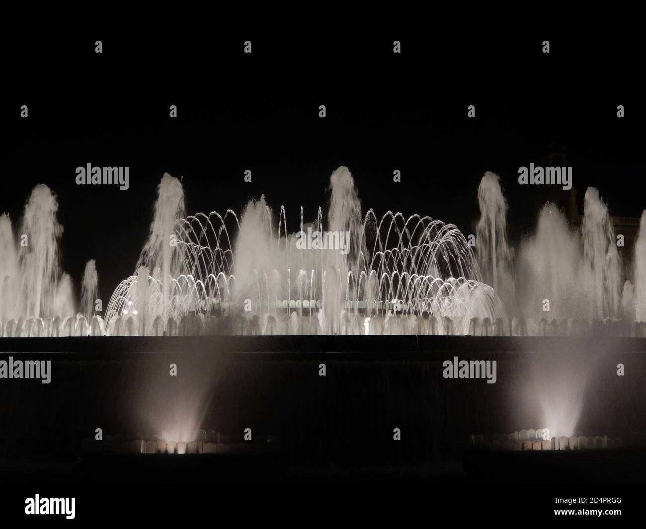 A water fountain in the night Stock Photo - Alamy