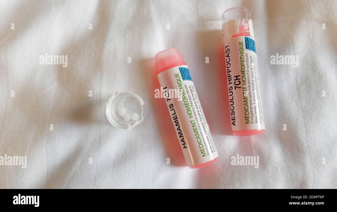 Two homeopathy tubes with granules. Natural medicine Stock Photo - Alamy