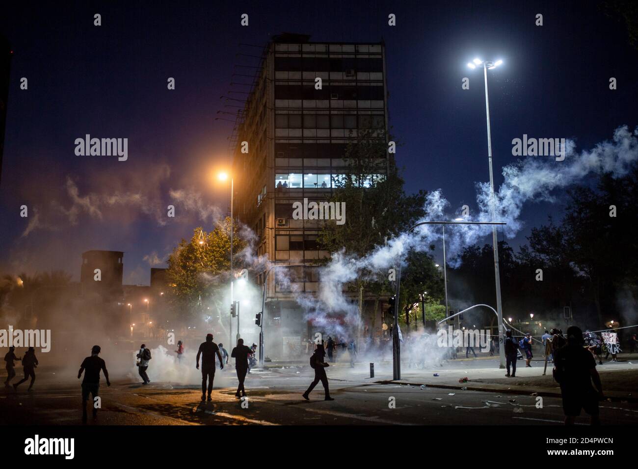 Protesters took to the Streets amidst tear gas smoke during the ...