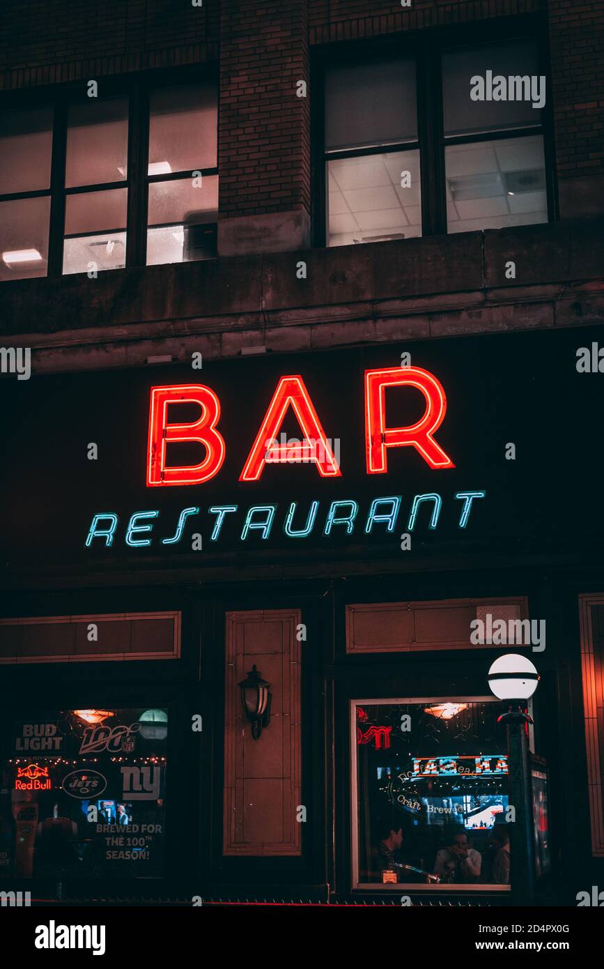Bar & Restaurant neon sign at night in Hells Kitchen, Manhattan, New ...