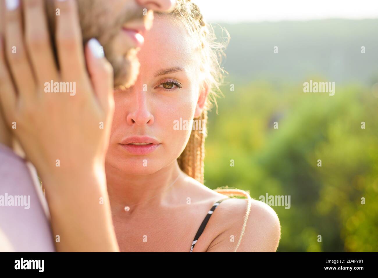 Passionate affectionate man and woman enjoying exciting moment of first ...
