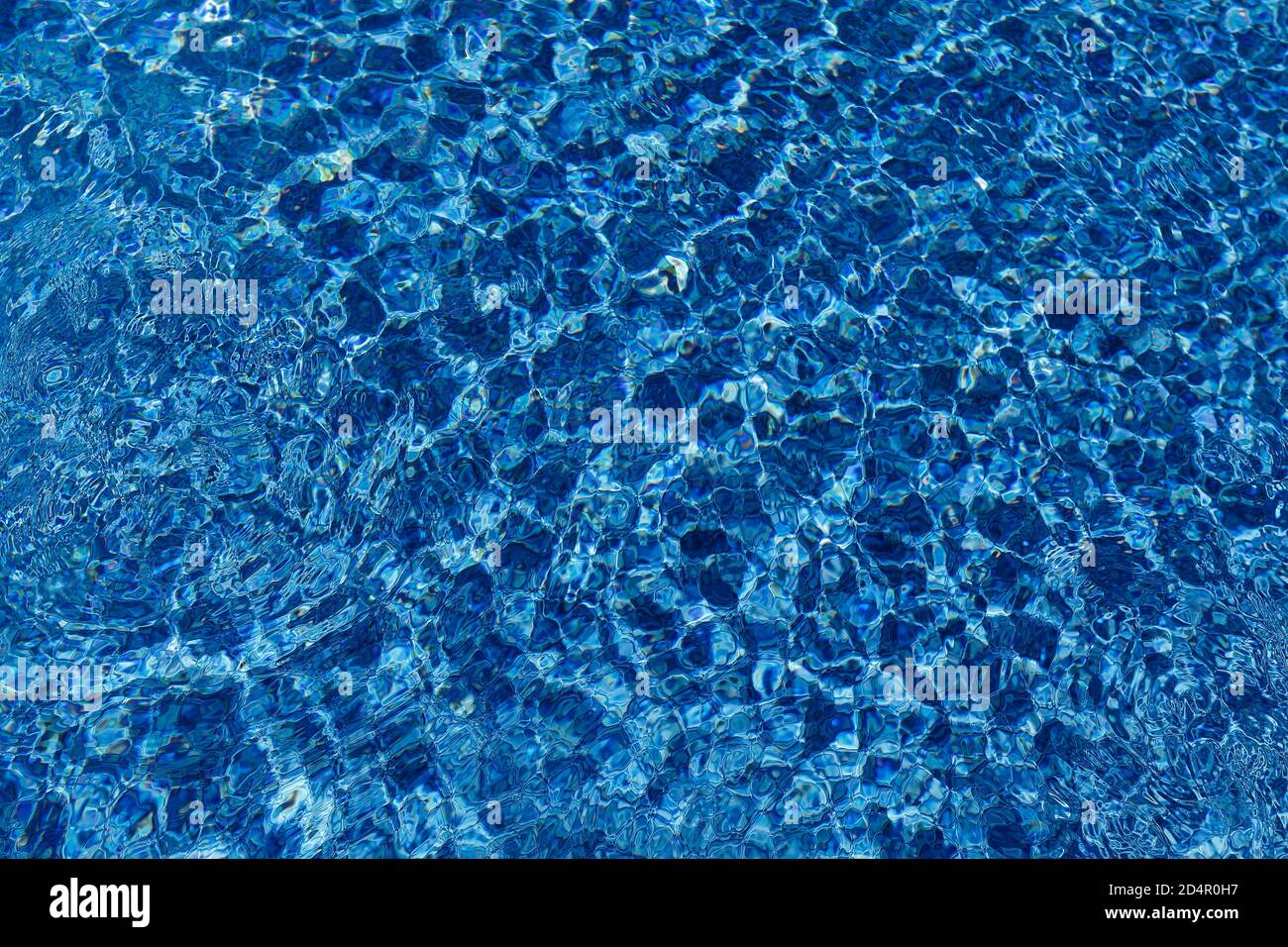 Water surface with reflections over stony ground, pattern, background ...
