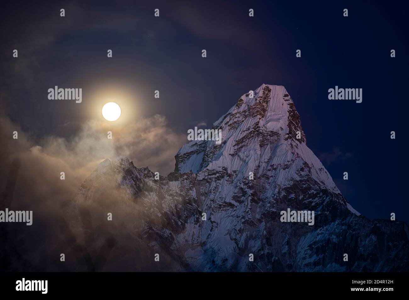 Ama Dablam 6812 m in the evening light with moon, Matterhorn of Nepal ...