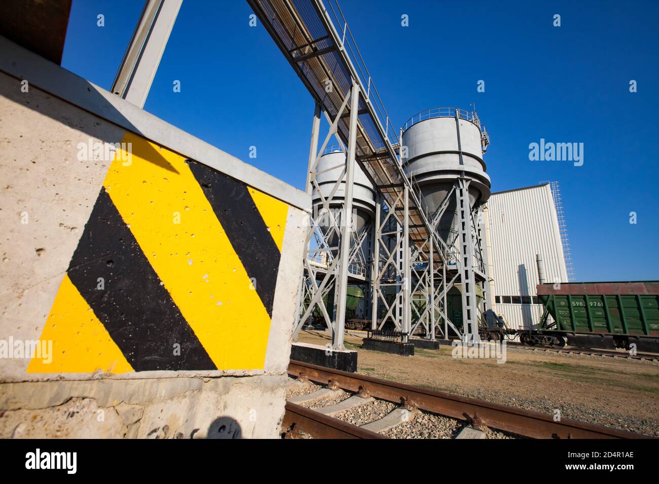Phosphate fertilizers plant. Loader station of fertilizers. Hopper car ...