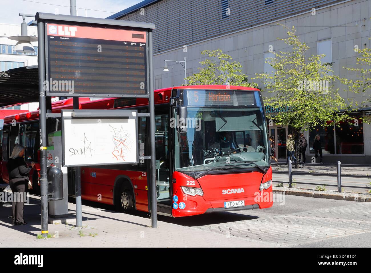 Lulea, Sweden - August 25, 2020: Red Scania city bus in service on line ...