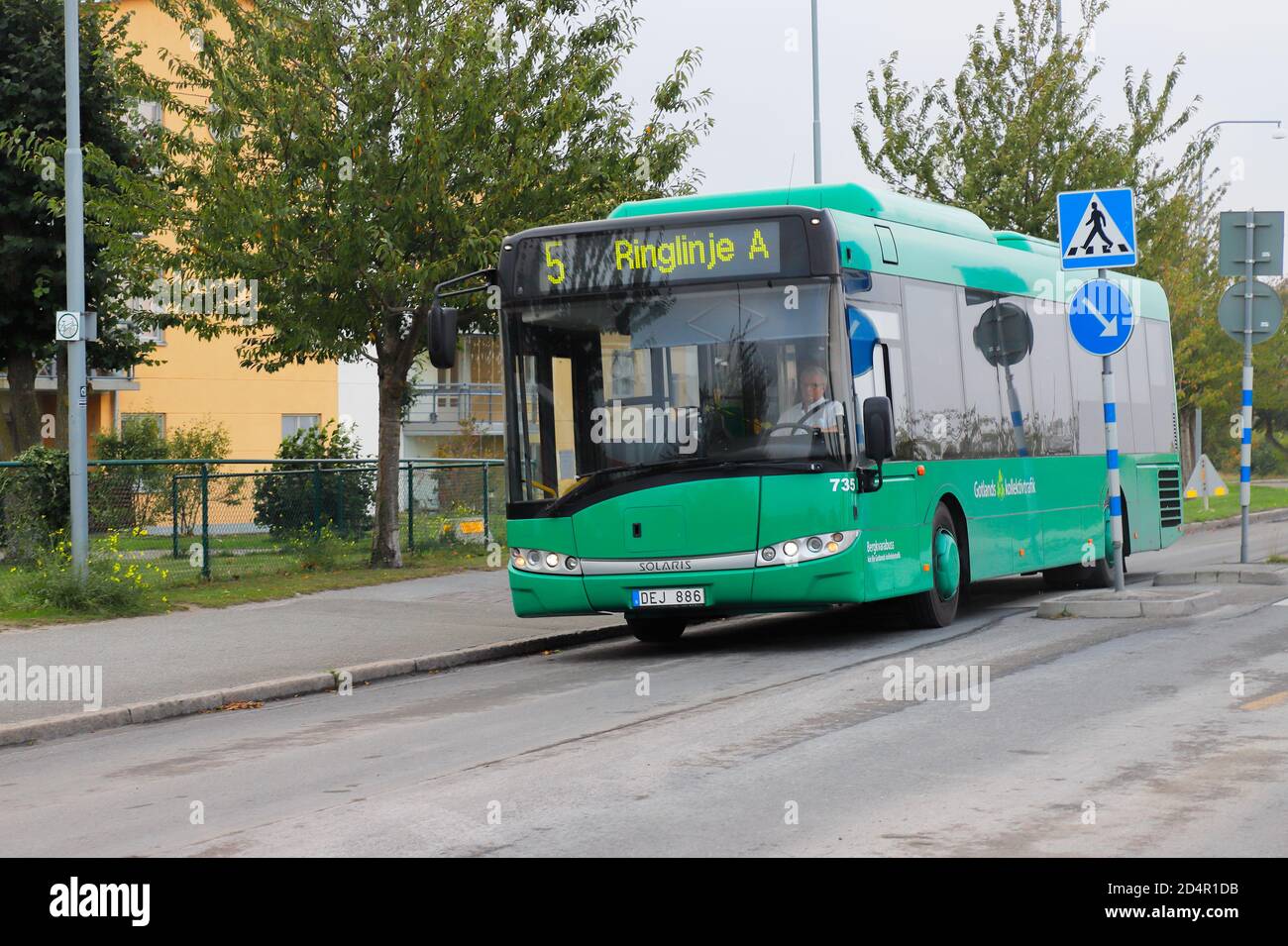 Visby, Sweden - October 4, 2020: Green city bus operates the number 5 ...
