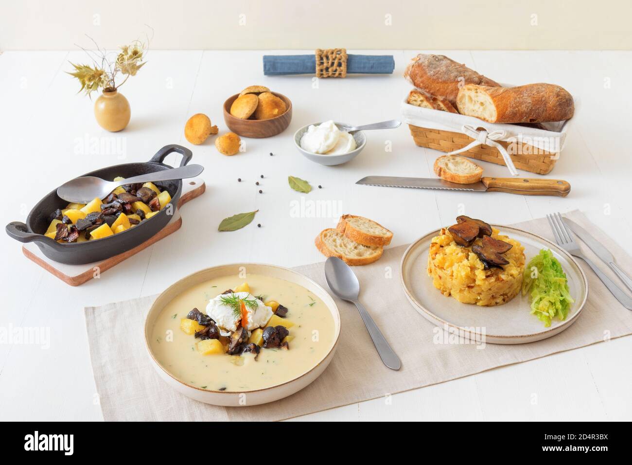 Fresh roasted boletus with mashed potatoes and kale. Thick creamy soup ...