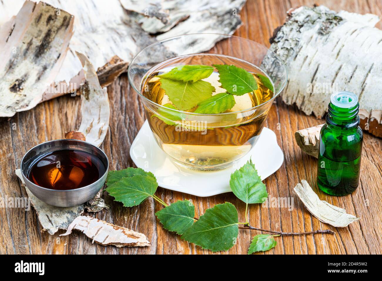 Birch tea and essential oil Stock Photo - Alamy