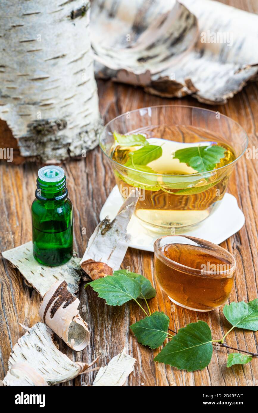 Birch tea and essential oil Stock Photo - Alamy