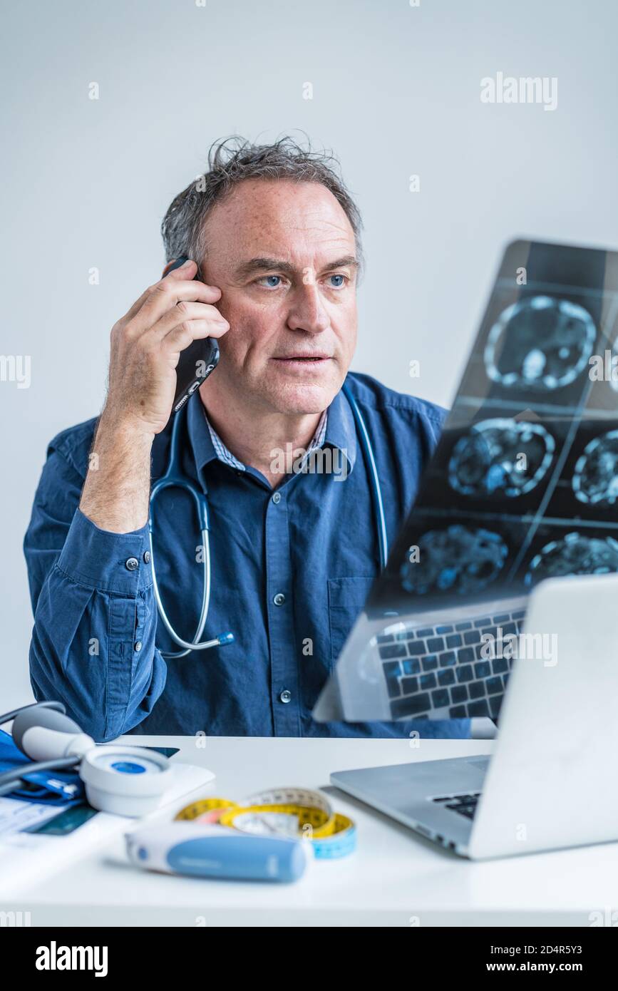 Gp doctor phone call hi-res stock photography and images - Alamy