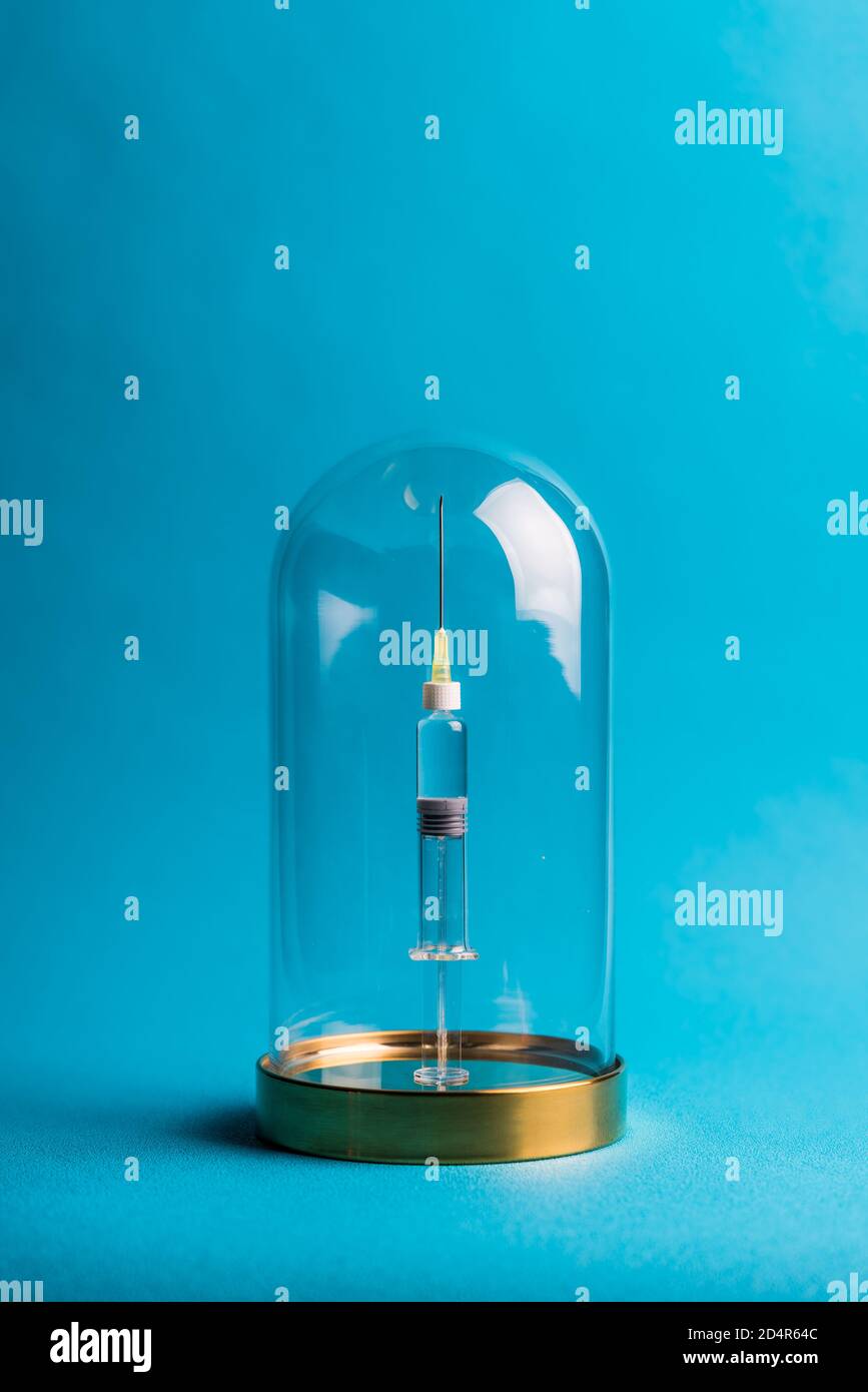 Vaccine under a bell Stock Photo - Alamy