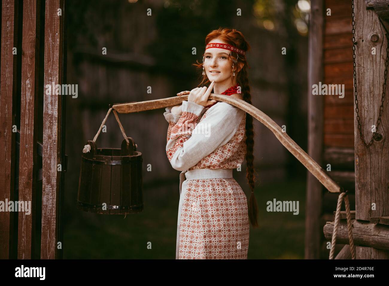 Beautiful Slavic girl with long blonde hair and brown eyes in a white ...