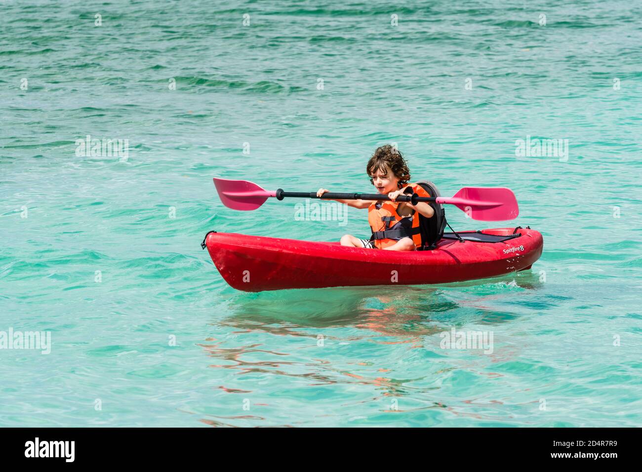 5 year old boy practicing canoe-kayak Stock Photo - Alamy