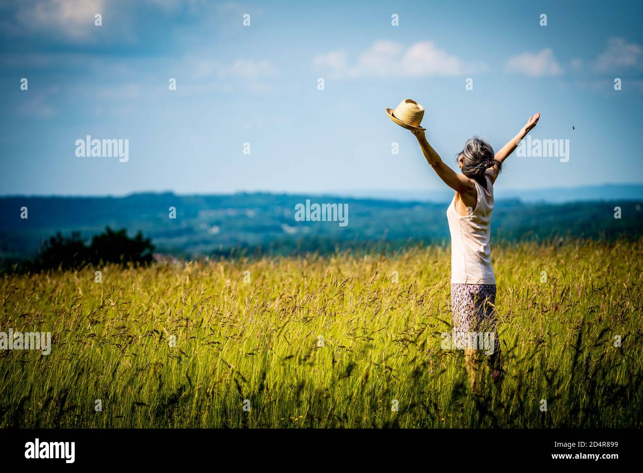 Woman in nature Stock Photo - Alamy