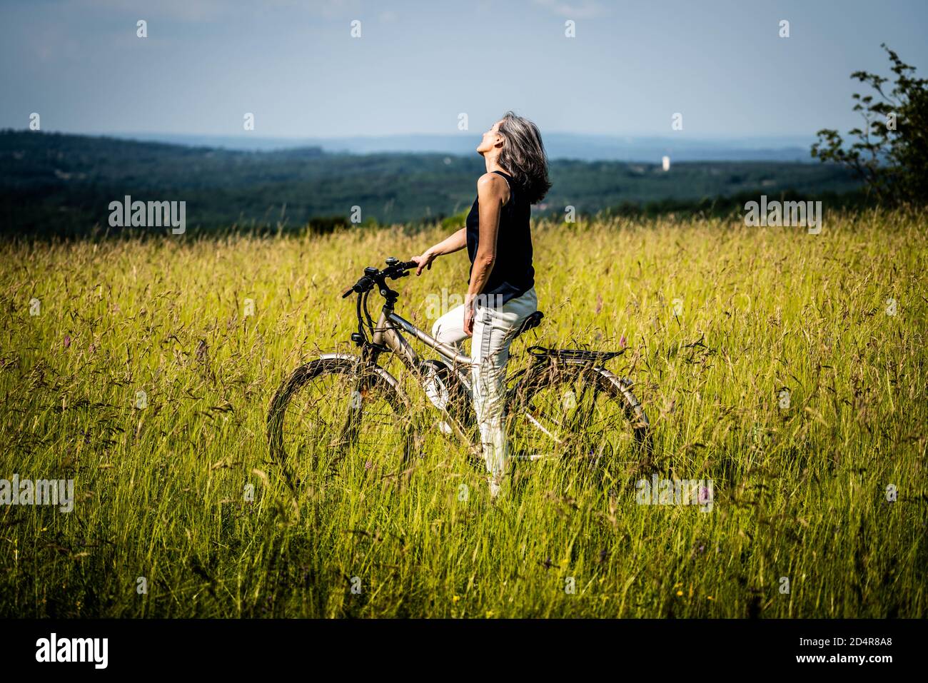 Woman cyclist 50 hi-res stock photography and images - Alamy