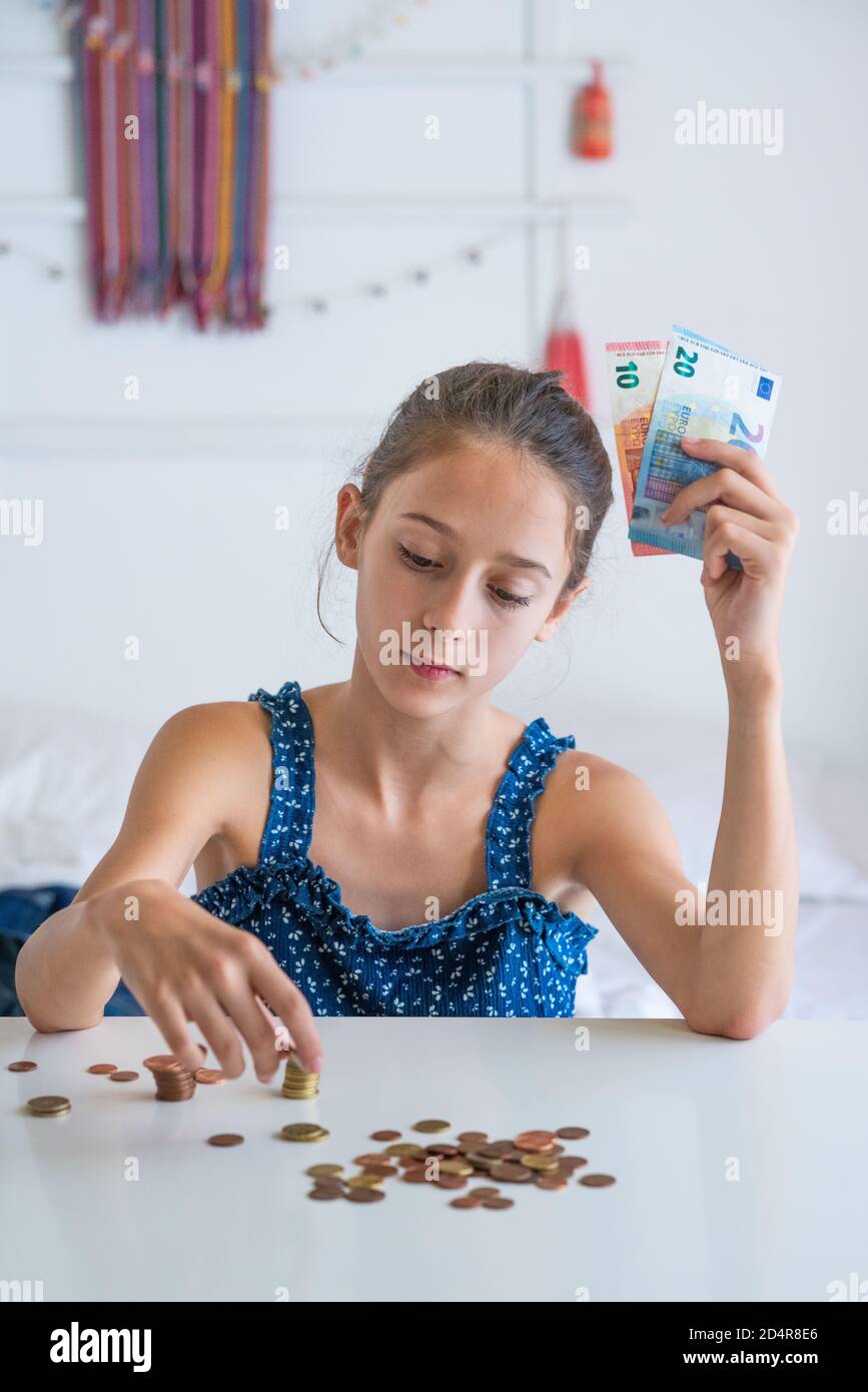 Kid pocket money hi-res stock photography and images - Alamy