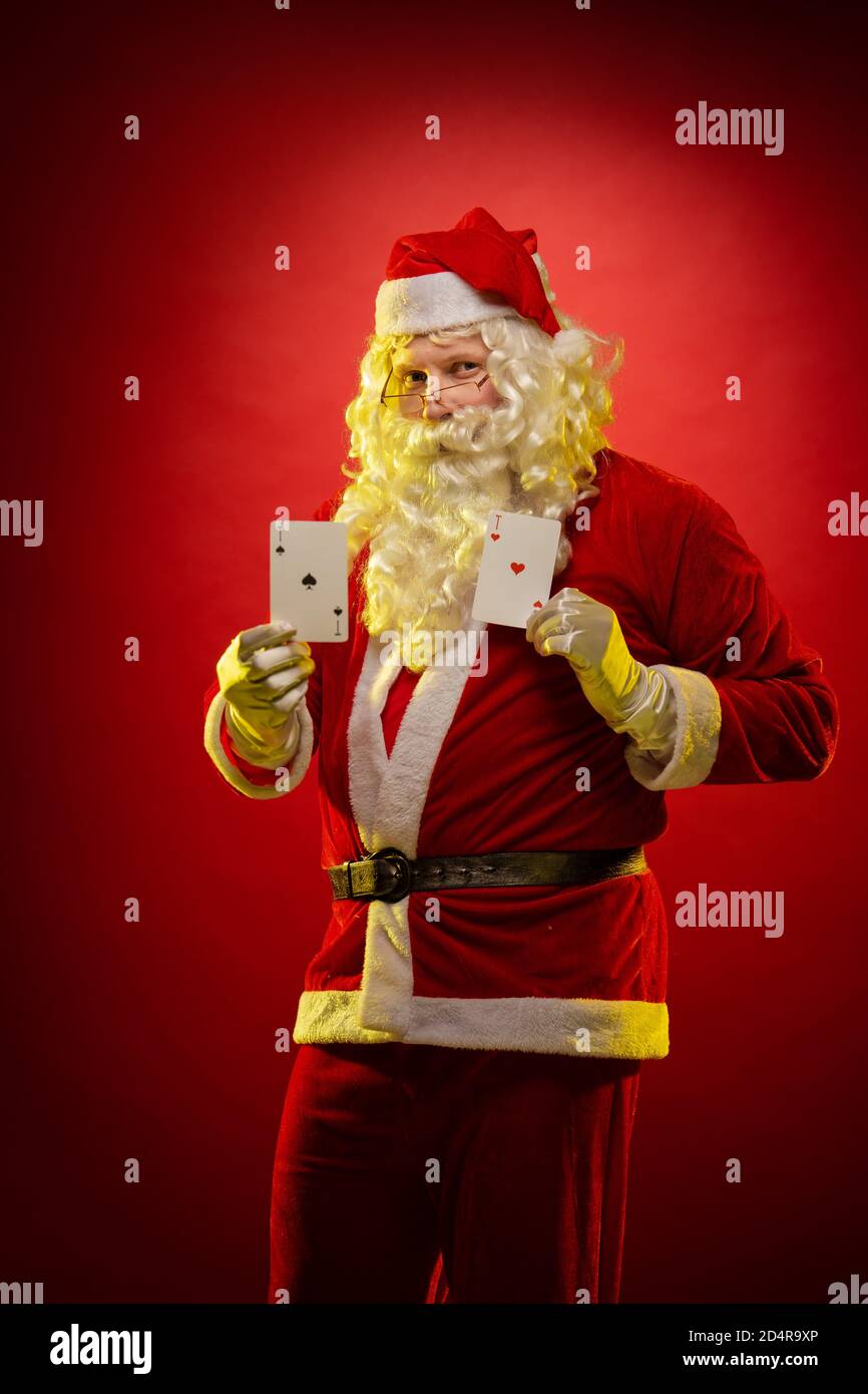 Santa claus playing cards hi-res stock photography and images - Alamy
